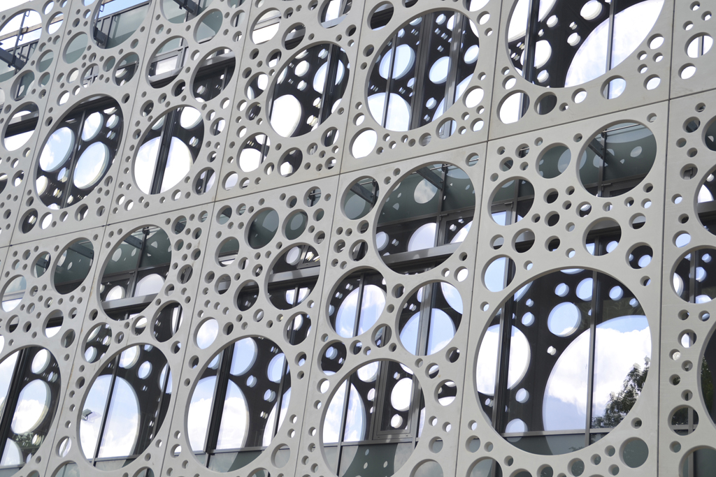 Concrete shroud for university building in Odense